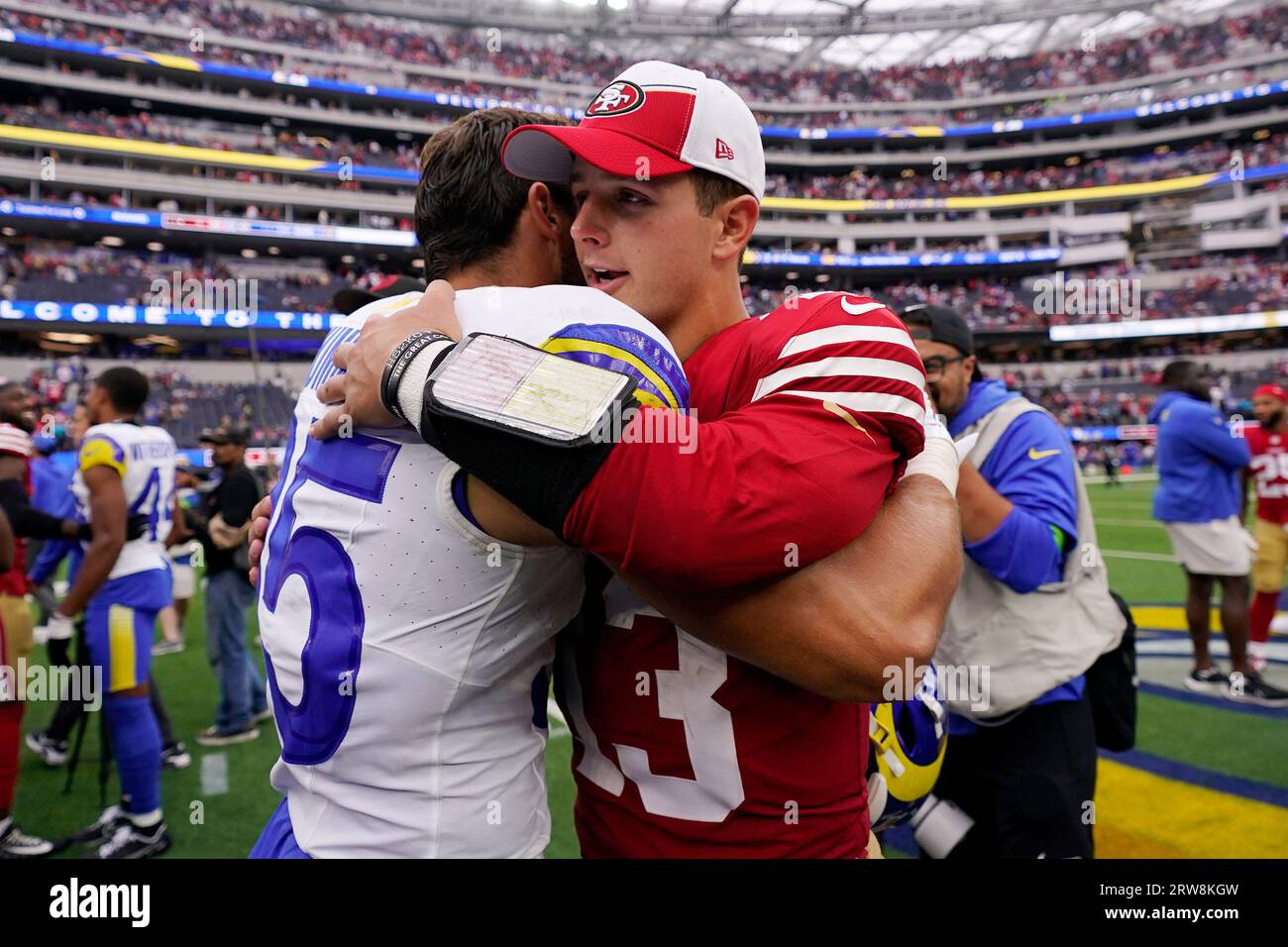 Los Angeles Rams linebacker Jake Hummel, left, and San Francisco 49ers ...