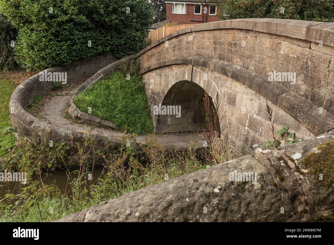 Ancient canal bridge used to move horses across to another towpath ...