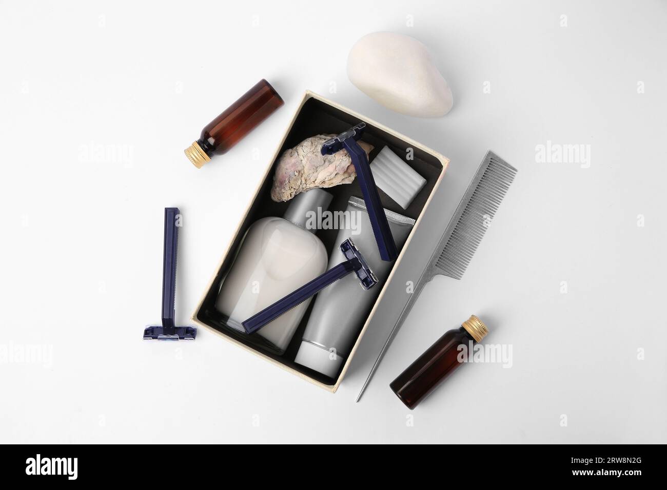 Different men's shaving accessories and box on white background, flat ...
