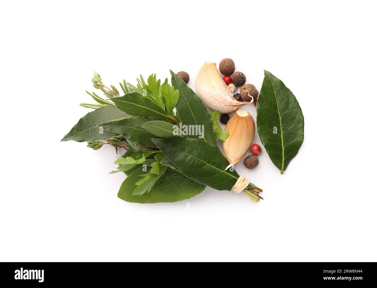 Bundle of aromatic bay leaves, different herbs and spices isolated on ...
