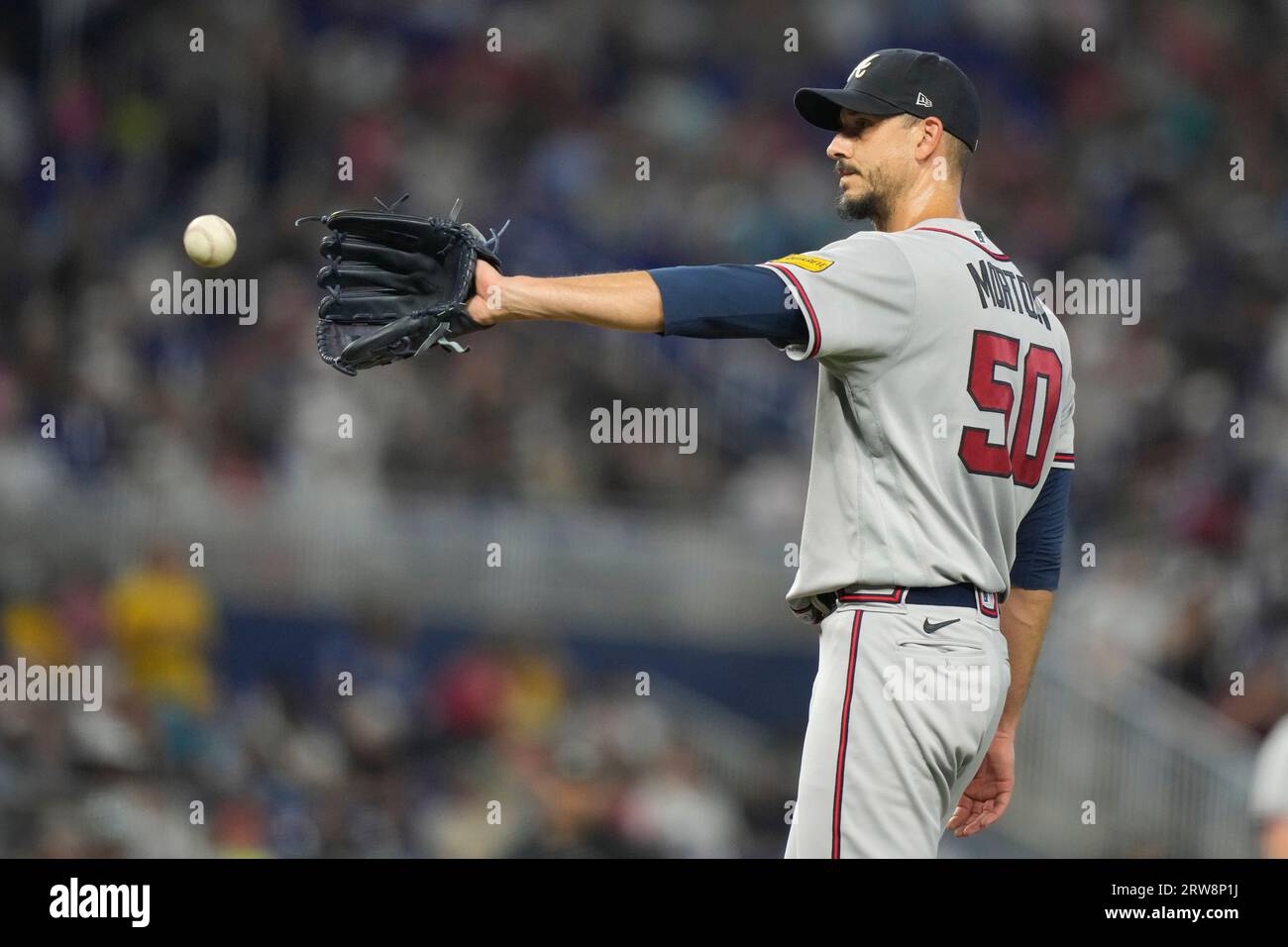 Atlanta Braves starting pitcher Charlie Morton (50) takes a throw ...