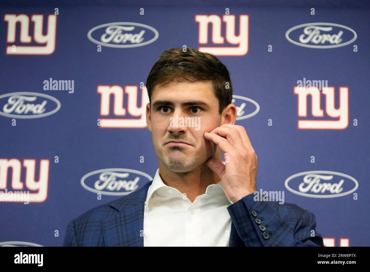 New York Giants quarterback Daniel Jones listens to a question during a ...