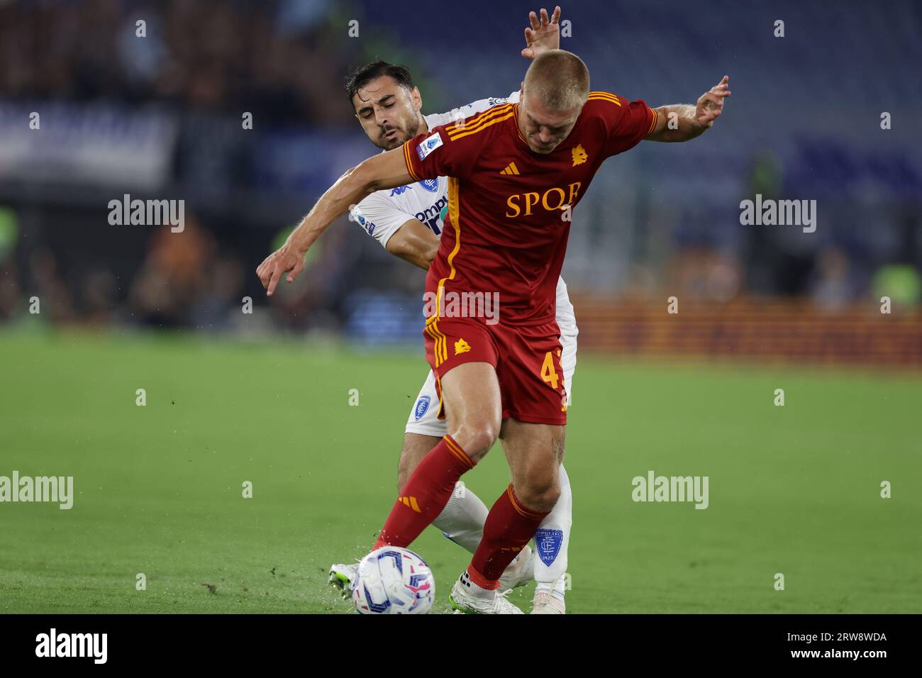Empoli's Italian defender Giuseppe Pezzella challenges for the ball ...