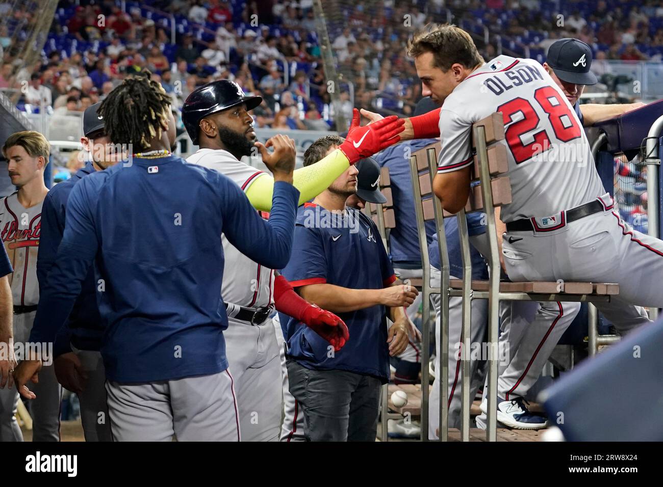 Atlanta Braves' Marcell Ozuna, left, is congratulated by Matt Olson (28 ...