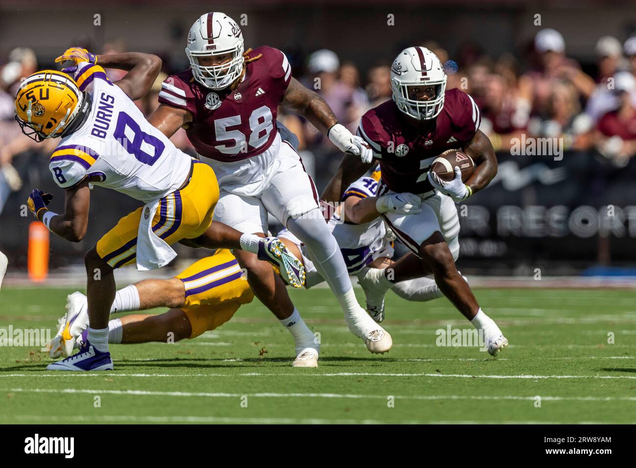Mississippi State running back Jo'Quavious Marks (7) runs behind the ...