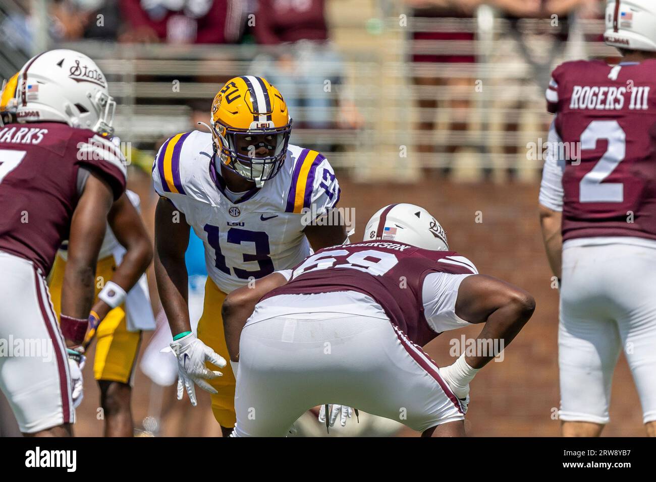 LSU defensive end Bradyn Swinson (13) lines up against Mississippi ...