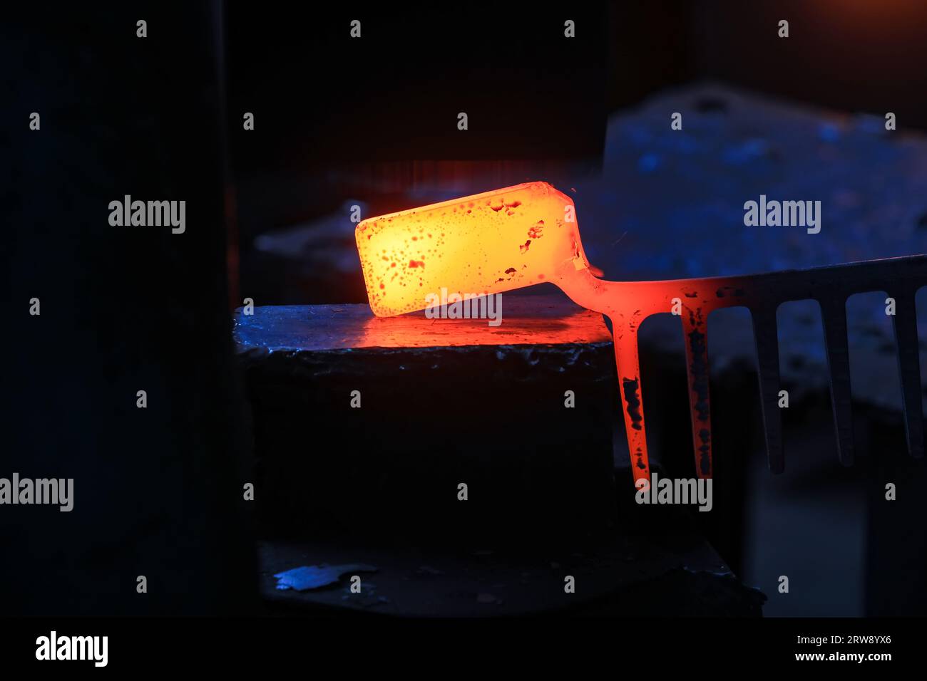 The steel billet in high temperature forging is in a hardware tool ...