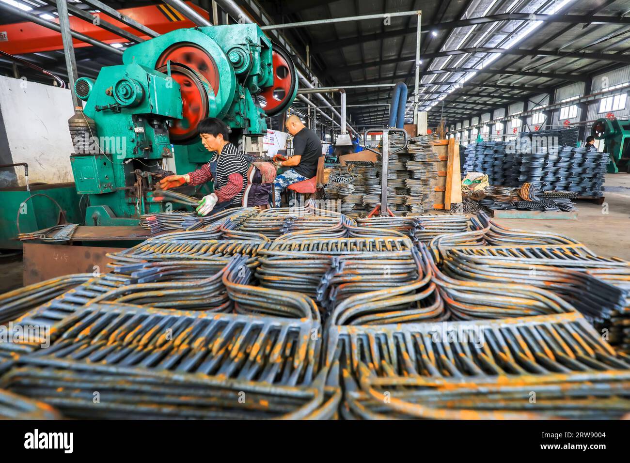 LUANNAN COUNTY, China - September 24, 2021: workers work intensively on ...