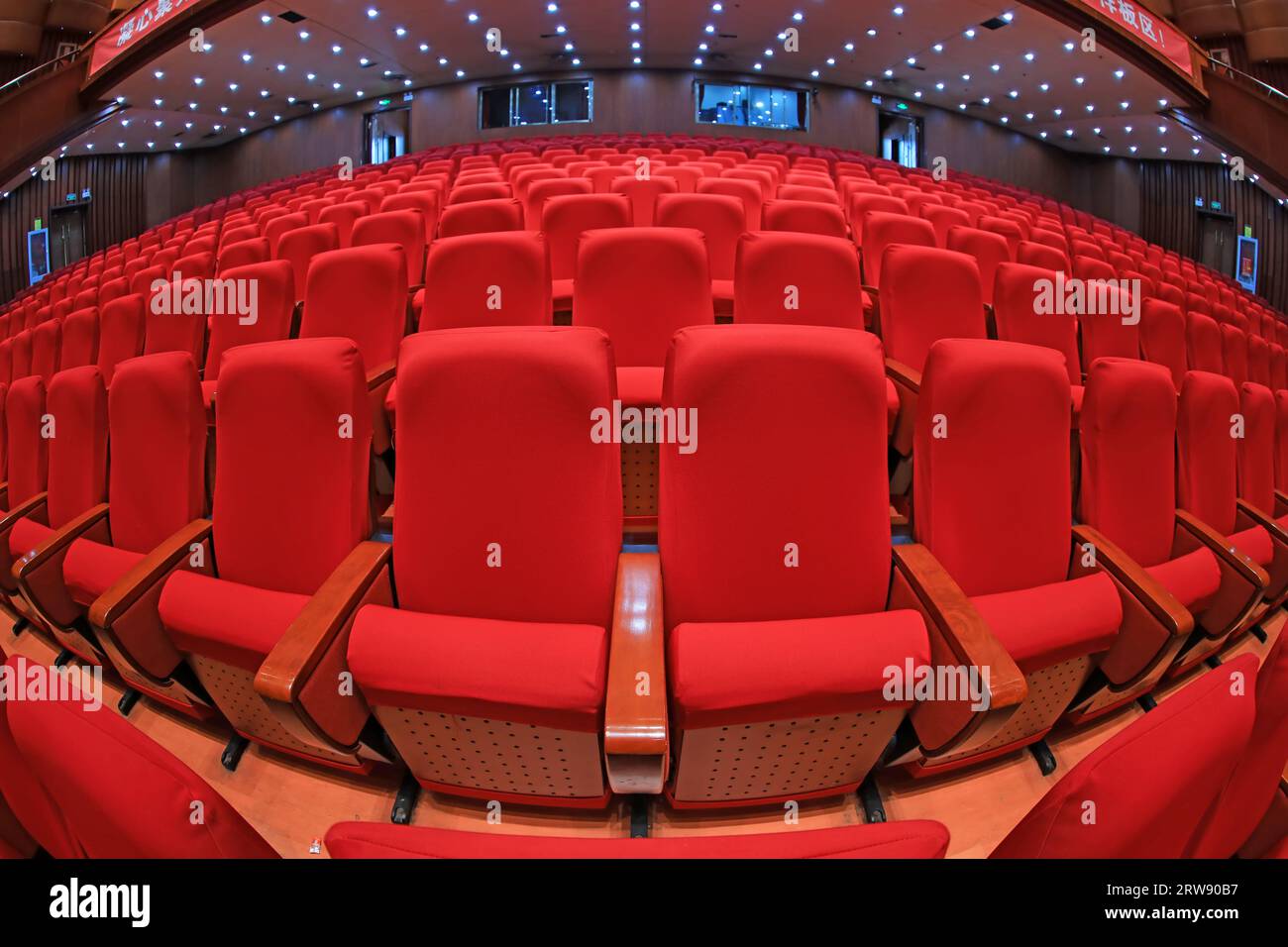 The red row chairs are in the theater, North China Stock Photo - Alamy