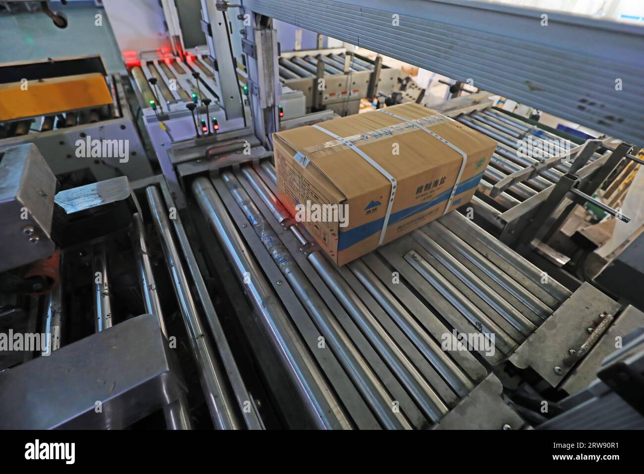 The salt packing line is in the factory Stock Photo - Alamy