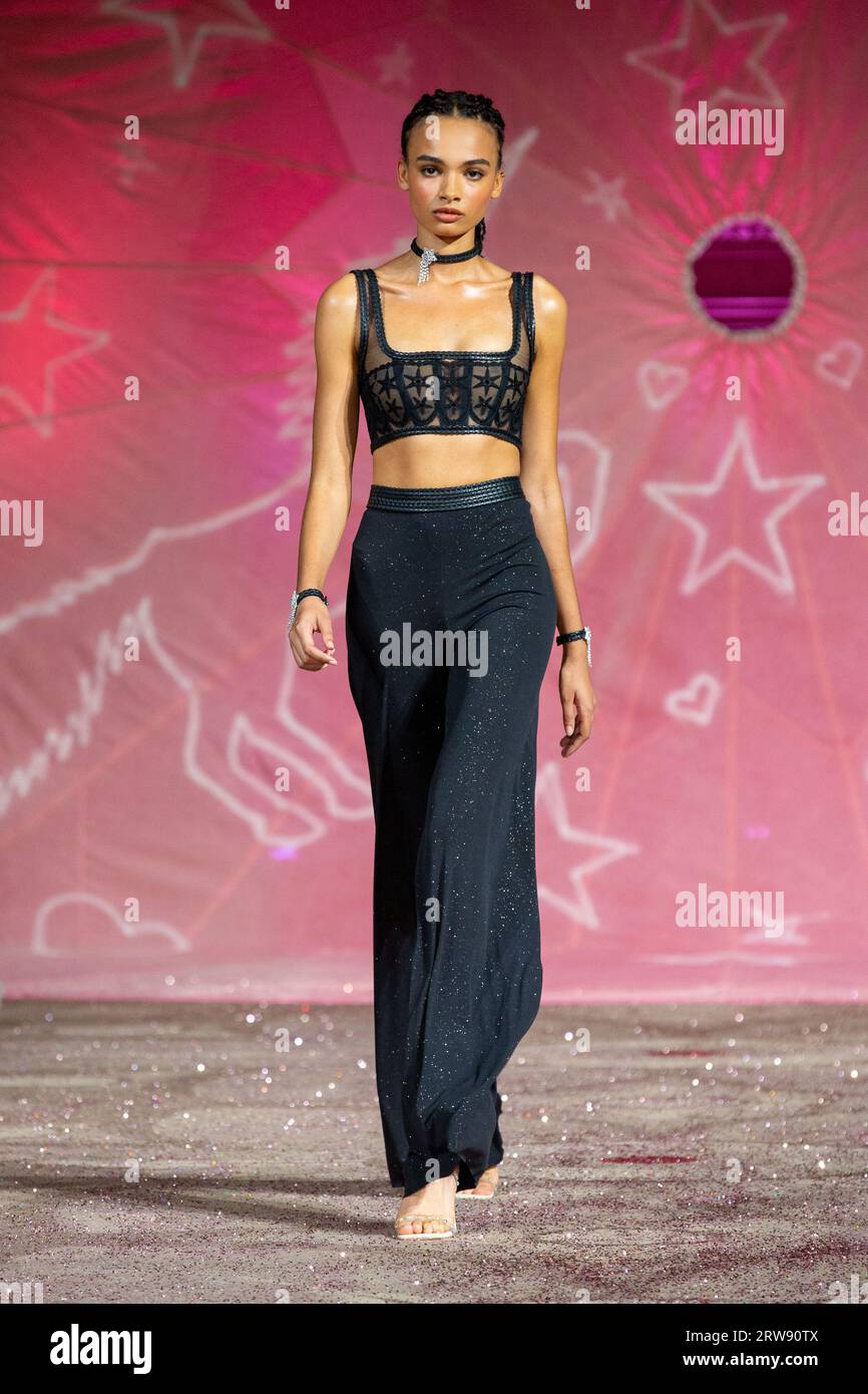 London, UK. 17th Sep, 2023. A model walks the runway at the Spring ...