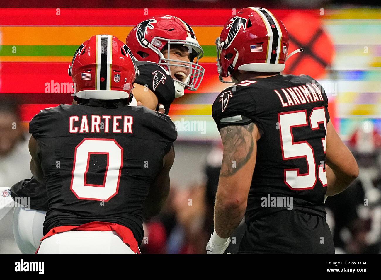 Atlanta Falcons linebacker Kaden Elliss, center, celebrates his sack on ...