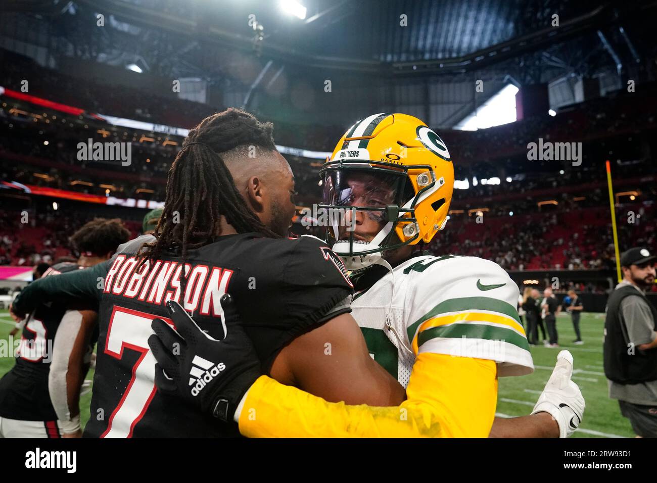 Atlanta Falcons' Bijan Robinson hugs Green Bay Packers Jaire Alexander ...