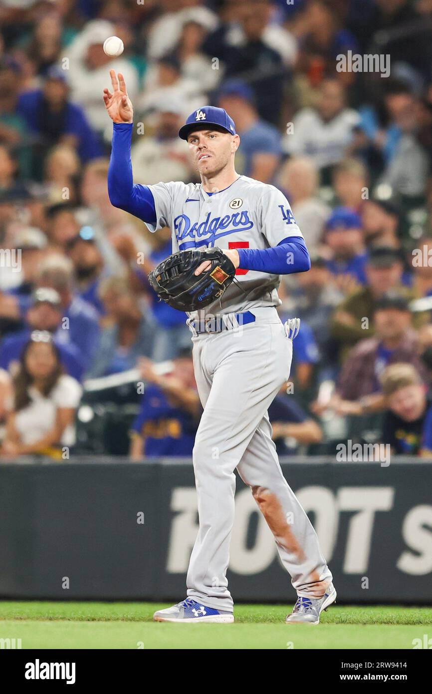 Los Angeles Dodgers first baseman Freddie Freeman throws after catching ...