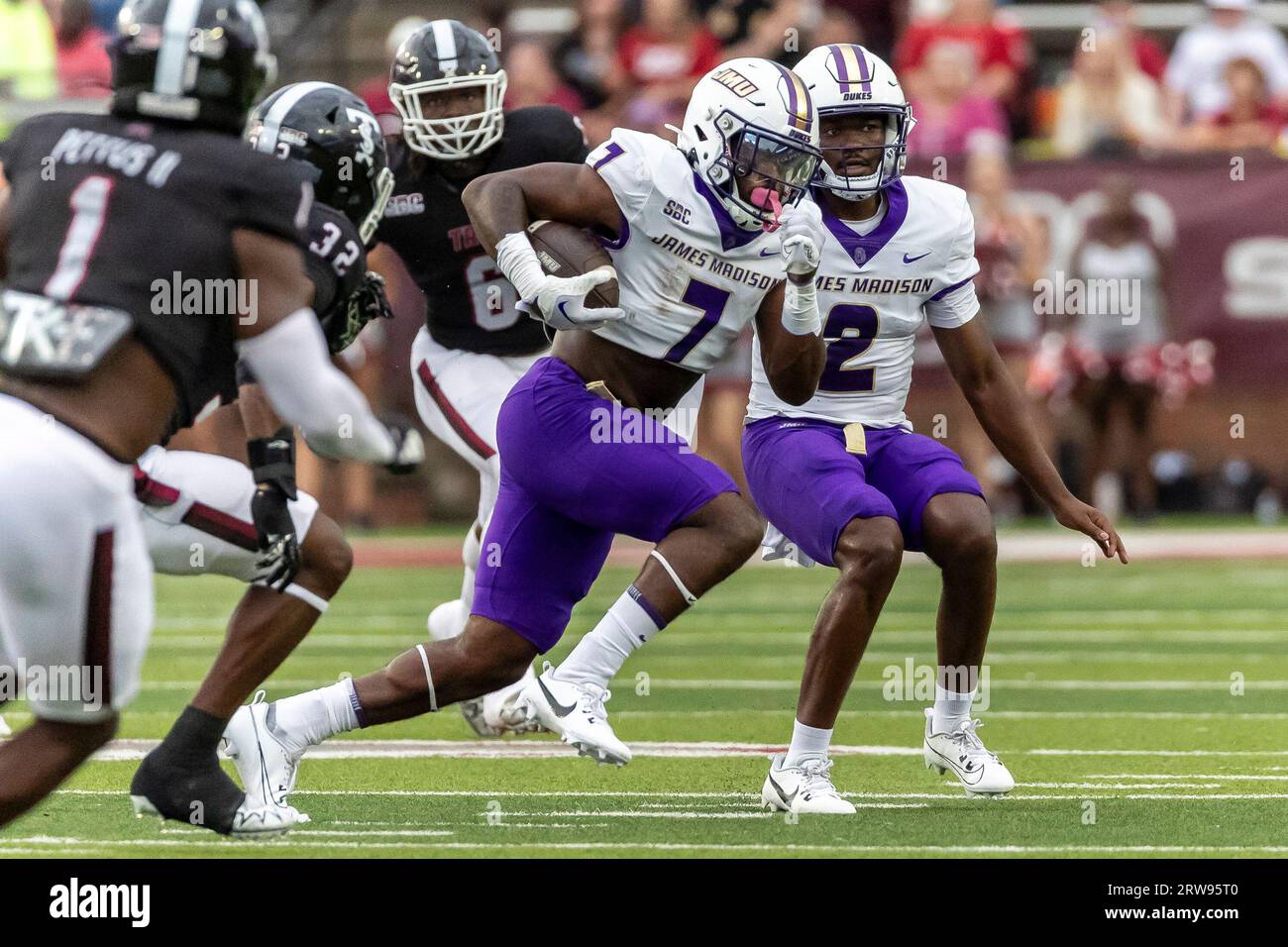 James Madison running back Ty Son Lawton (7) runs the ball against Troy ...
