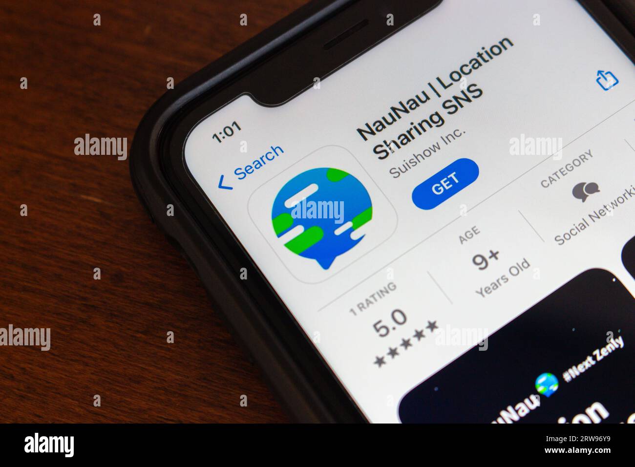 NauNau app seen in App Store on iPhone screen. NauNau is a service that allows you to check the ...