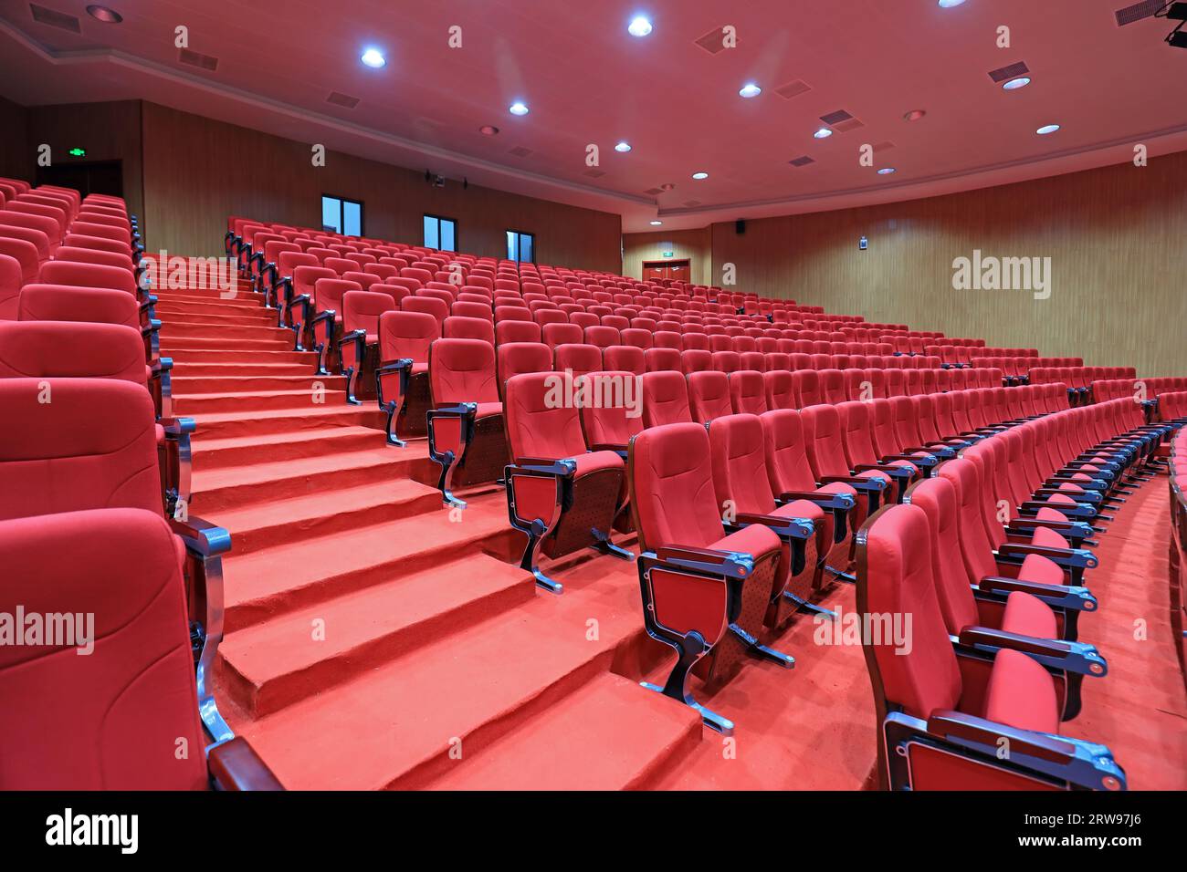 The red row chairs are in the theater, North China Stock Photo - Alamy
