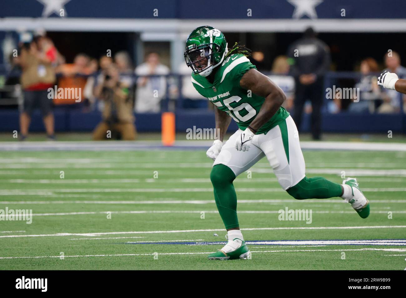 New York Jets linebacker Quincy Williams (56) defends against the ...