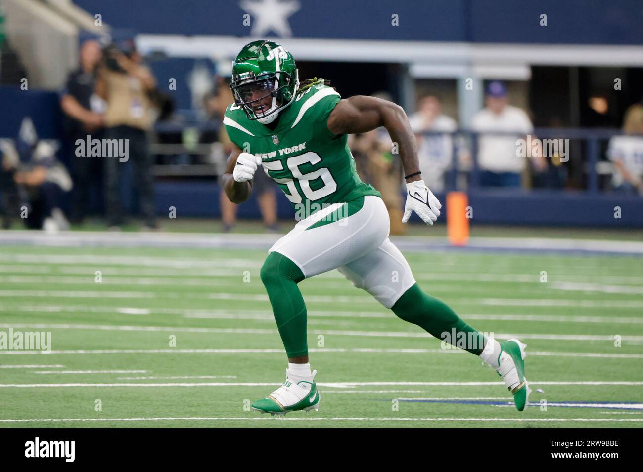 New York Jets linebacker Quincy Williams (56) defends against the ...