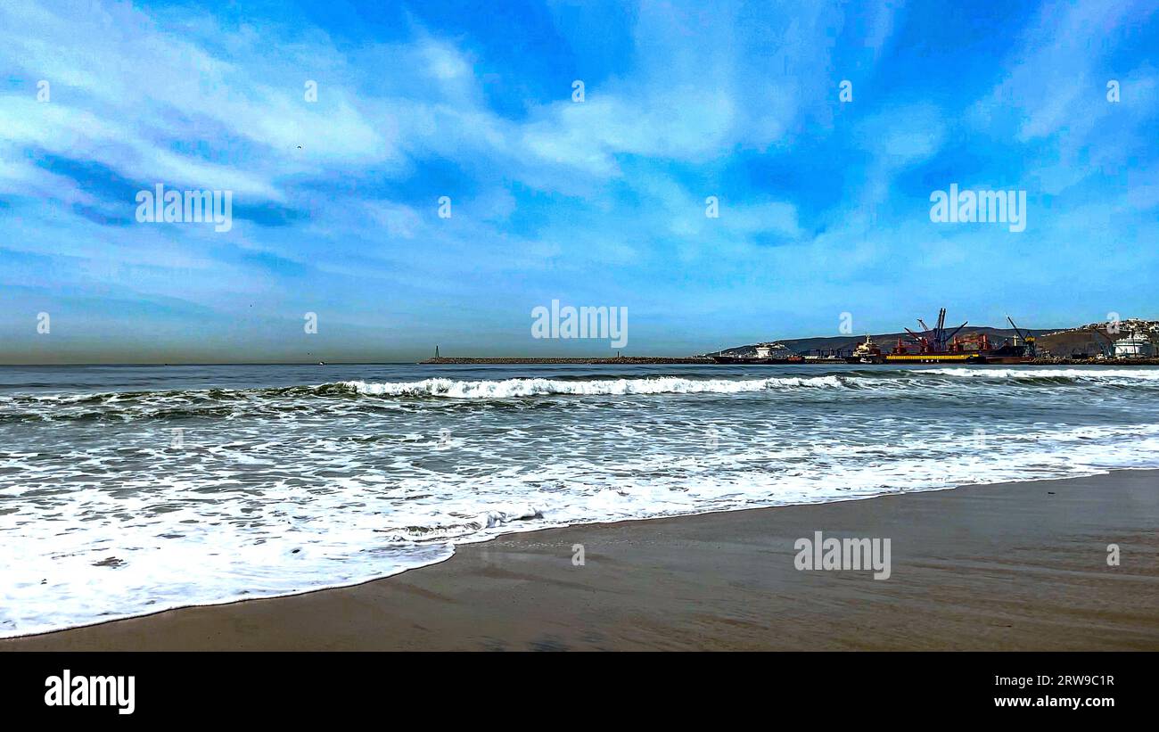 The Pacific Ocean reaching the sand of one of the beaches of Ensenada ...