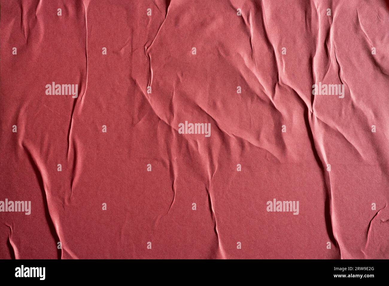 Red wheat paste poster style texture background Stock Photo - Alamy