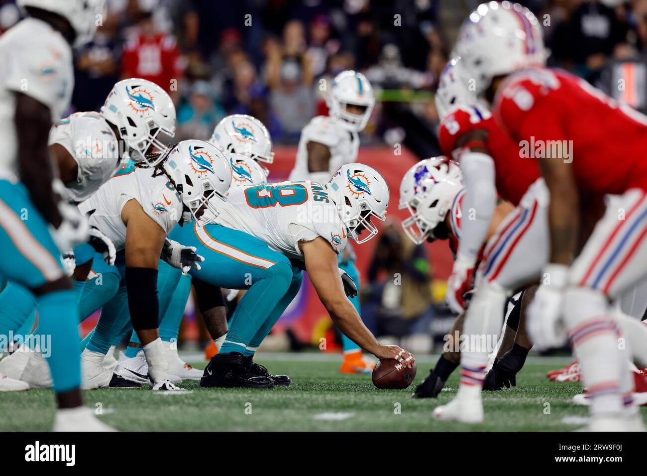 The Miami Dolphins play against the New England Patriots during an NFL ...