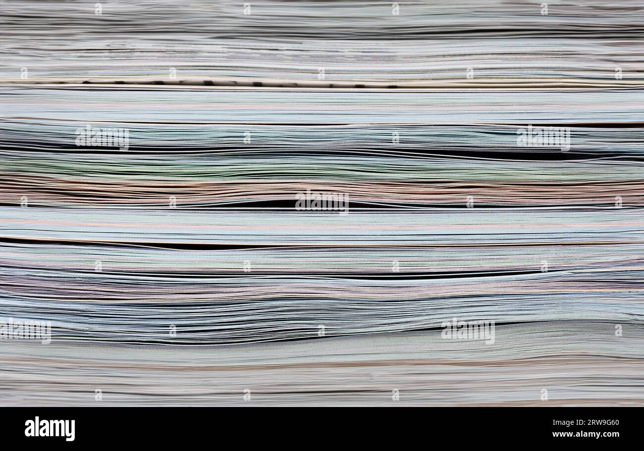 Pile of newspapers in white background hi-res stock photography and ...