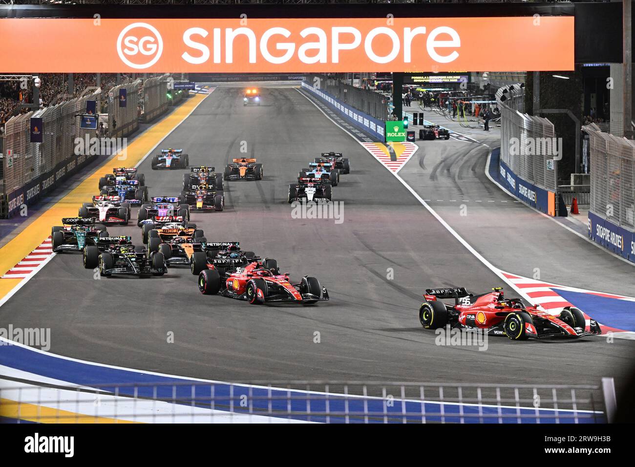 Singapore. 17th Sep, 2023. Ferrari driver Carlos Sainz (front) of Spain ...
