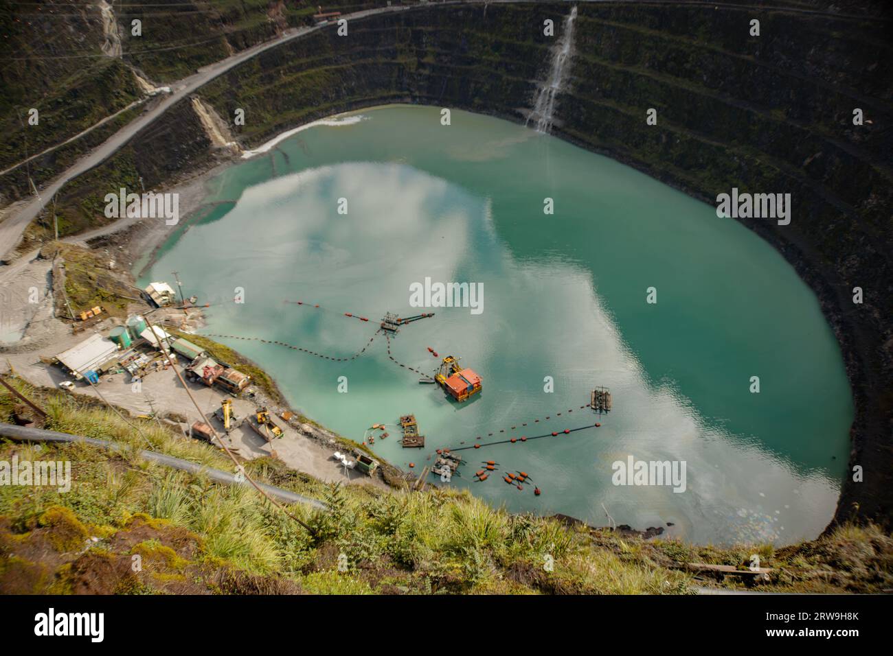 The old Ertsberg mine that is now flooded with water Stock Photo - Alamy
