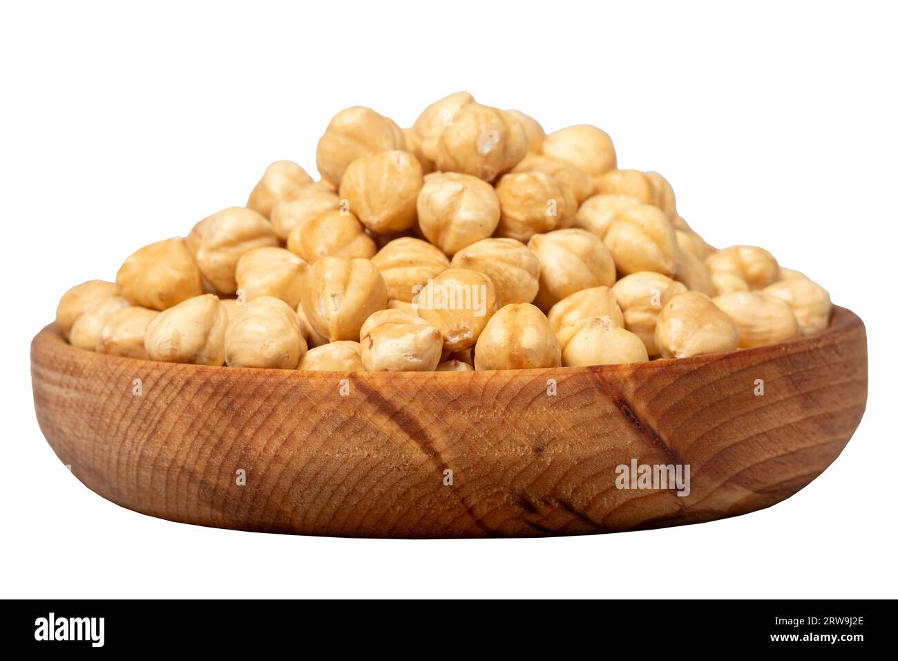 Roasted hazelnuts in wood bowl. Peeled hazelnuts kernel isolated on ...