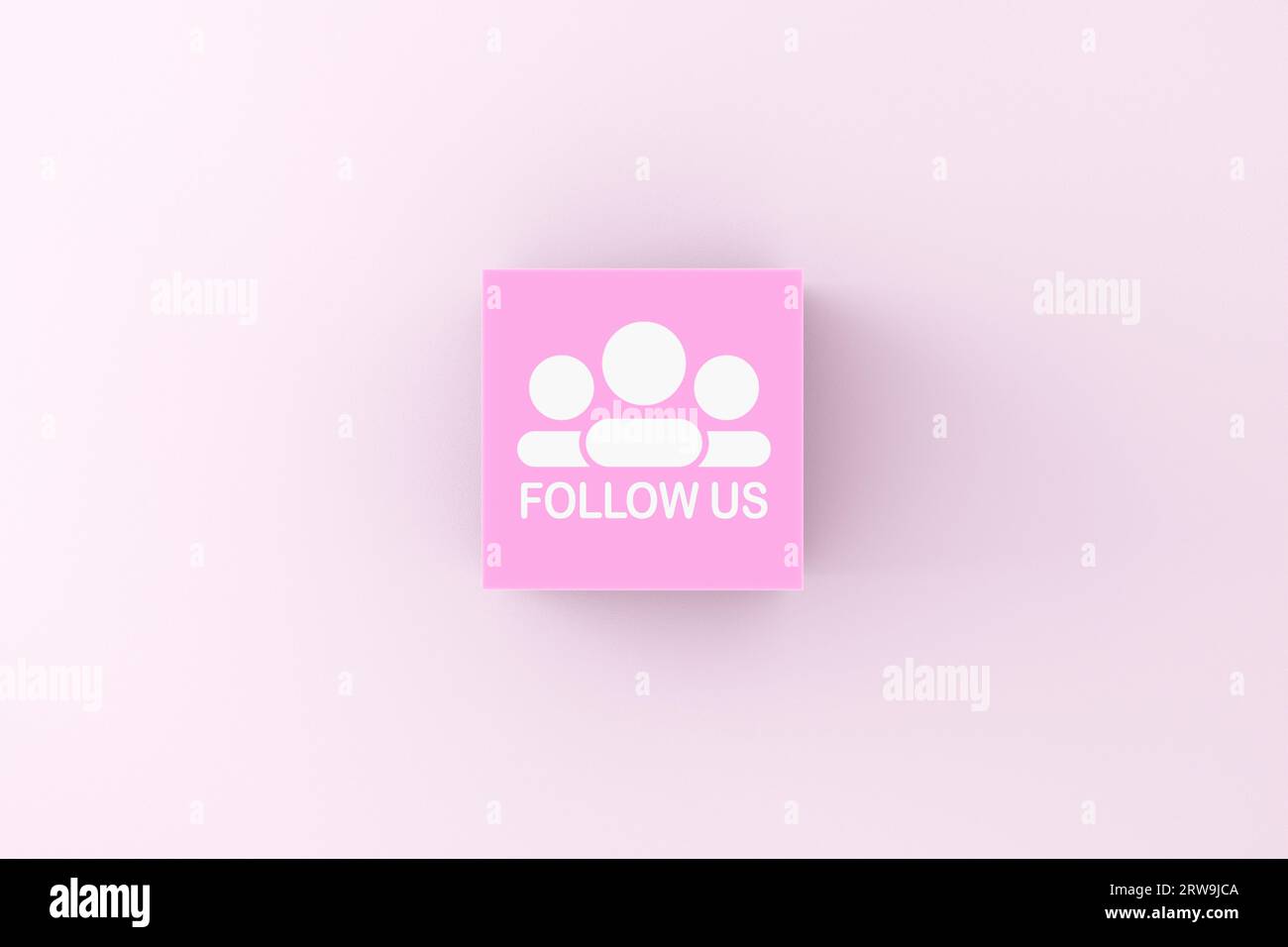 Follow us message on a pink cube block. Social Media Networking ...