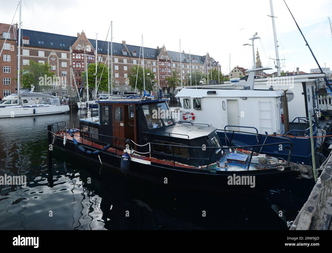 Boats docking on the Christianshavn canal in Copenhagen, Denmark Stock ...