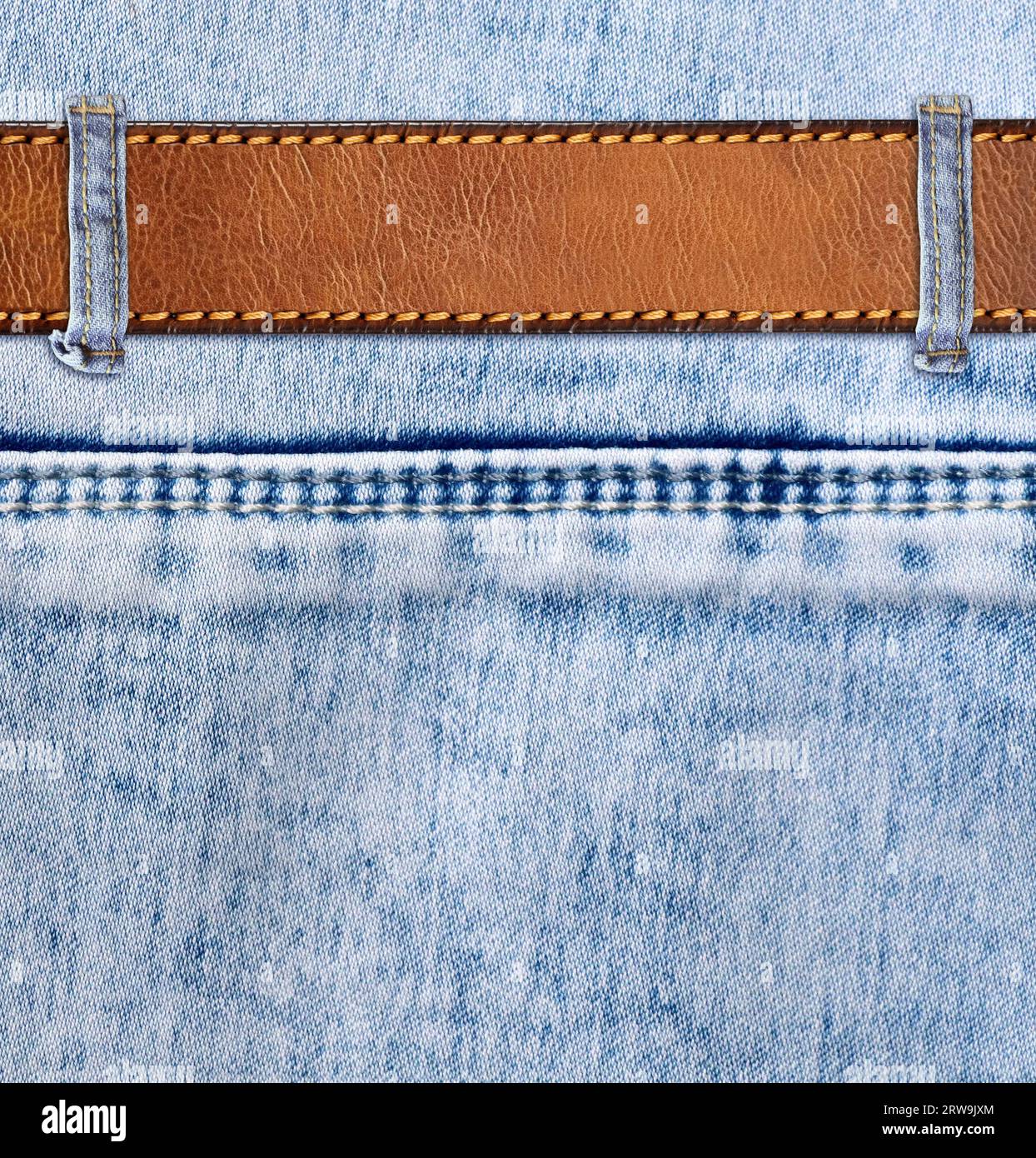 Blue denim background with leather belt. Horizontal or vertical ...