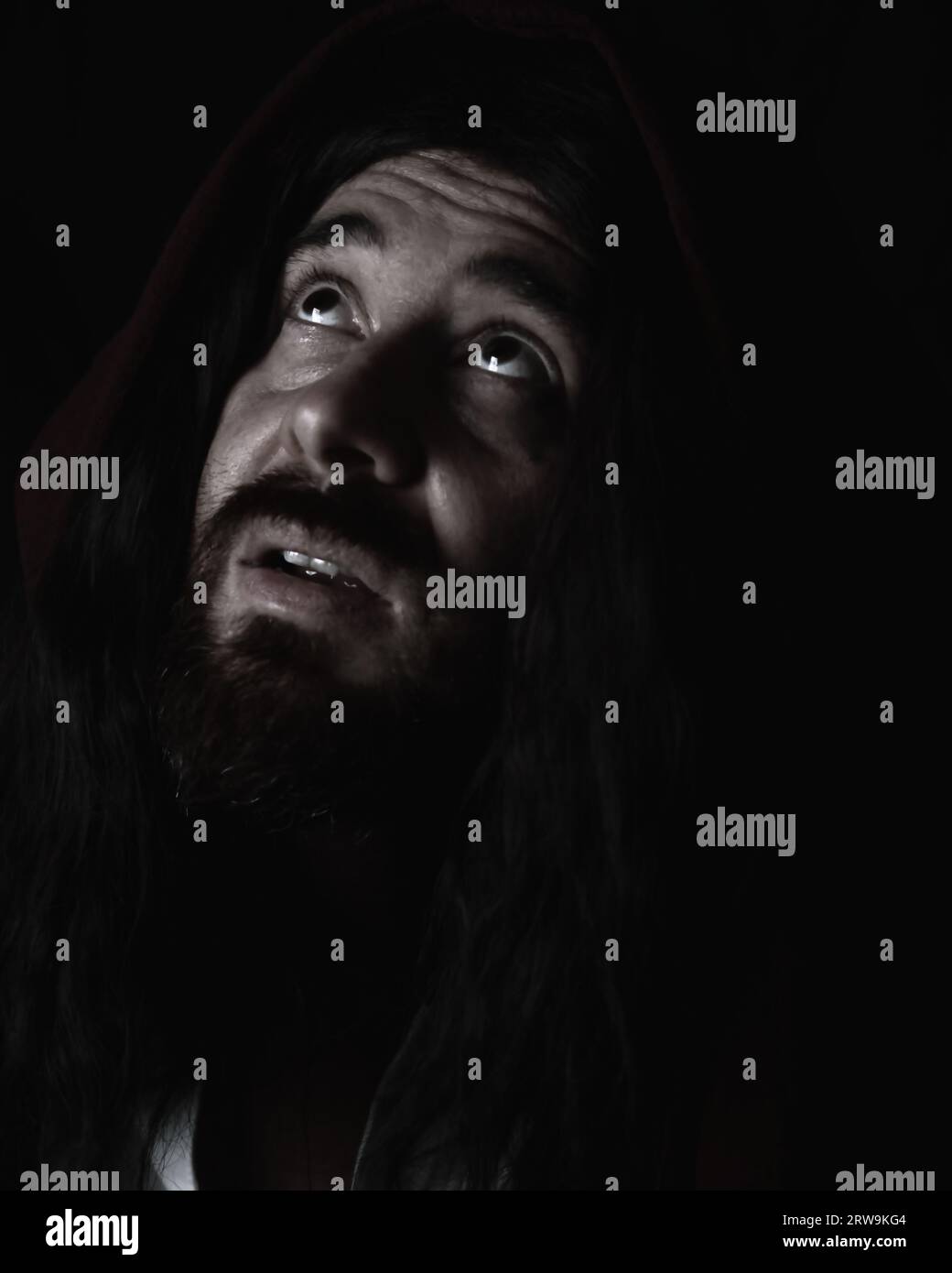 A portrait of a model dressed as Jesus Christ or a biblical character ...