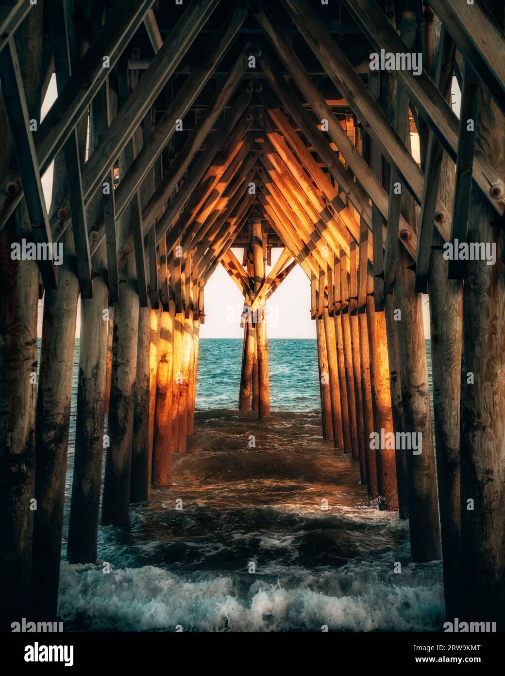 Shoreline surf waves wooden pier hi-res stock photography and images ...