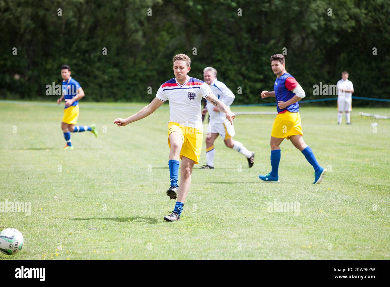 Mr england playing football hi-res stock photography and images - Alamy