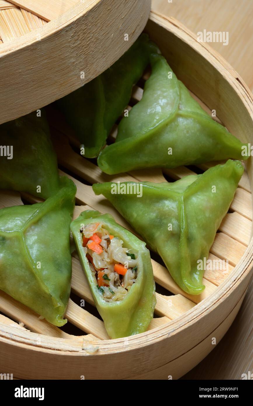 Gyoza, Japanese dumplings with shiitake filling in steamer Stock Photo ...