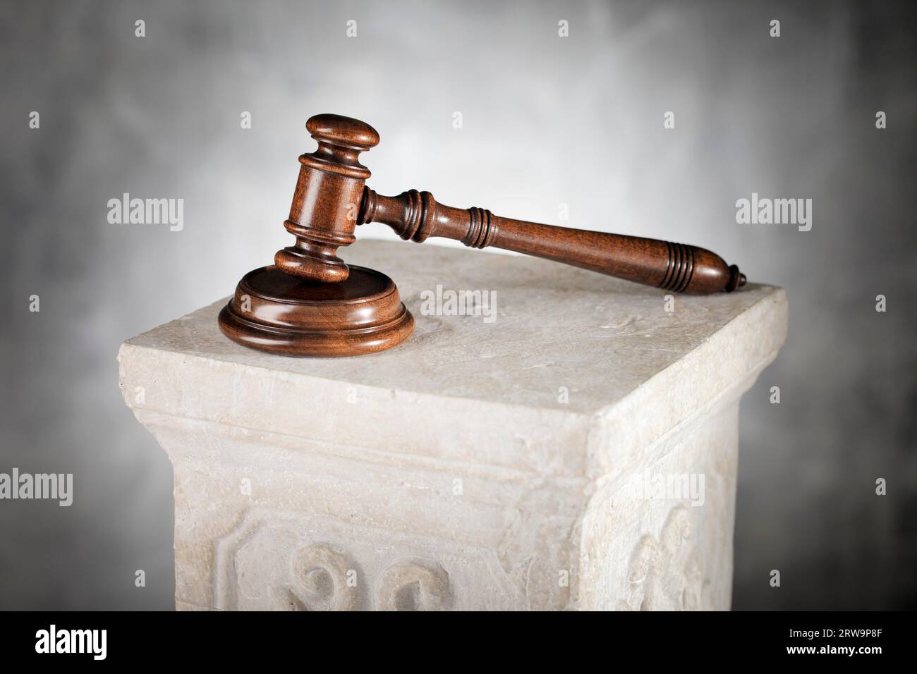Mahogany gavel and sound block on a plaster column Stock Photo - Alamy