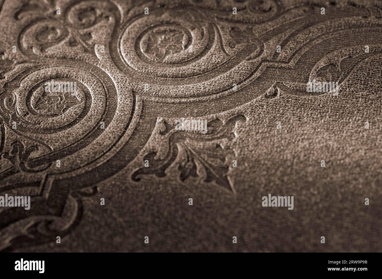 Sepia toned detail of an old book cover (Nya Illustrerade Magazin ...