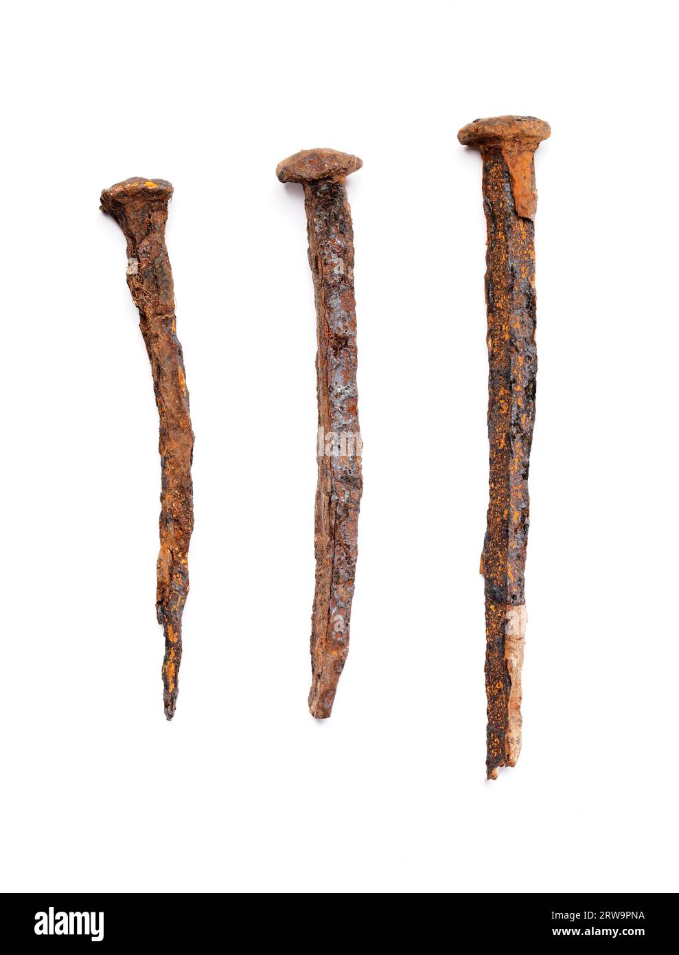 Old handforged rusty nails isolated on white with natural shadows Stock ...
