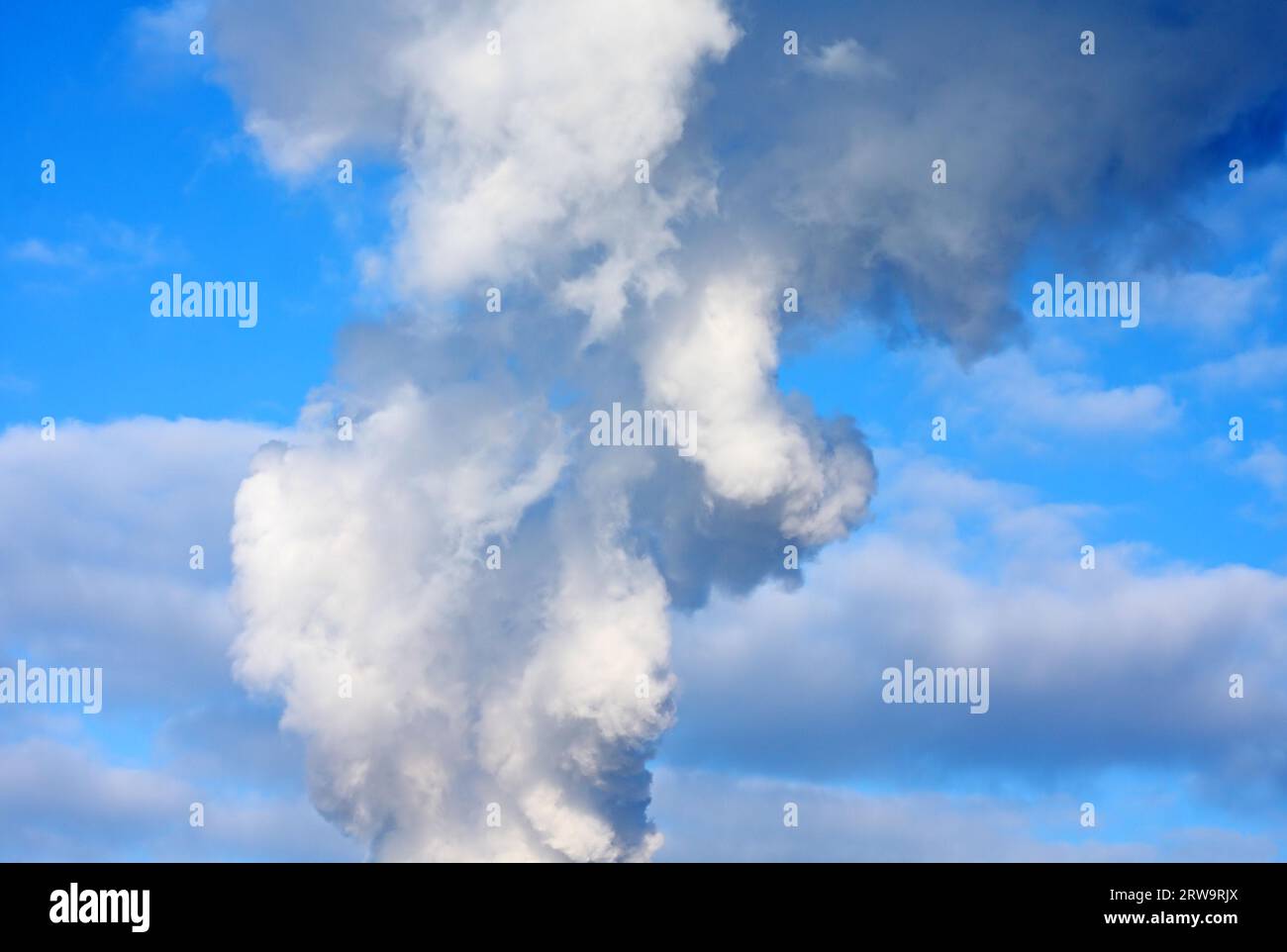 Water vapour discharge, background blue-white sky Stock Photo - Alamy