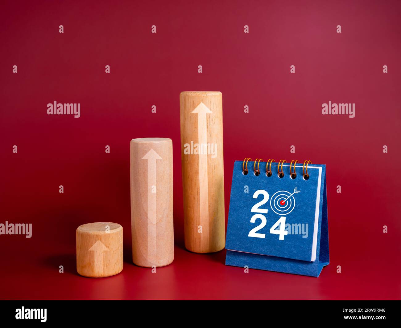 2024 New year business growth with rise up arrows on wood sticks step ...