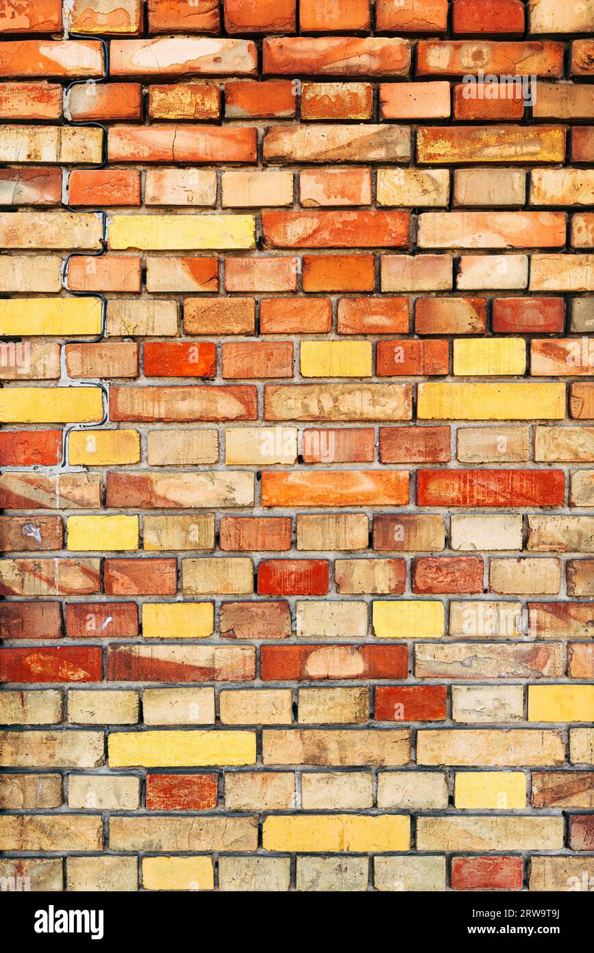 Vertical shot of rustic brick wall as background Stock Photo - Alamy
