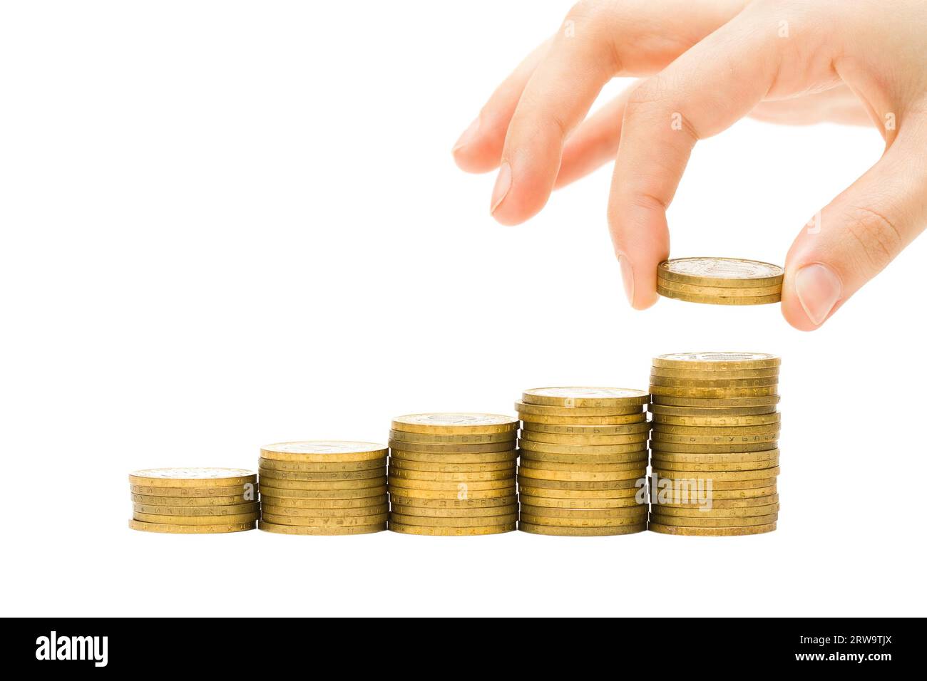 Money concept, hand putting coins on golden money stacks Stock Photo ...