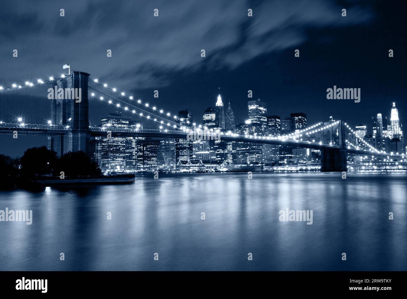 Brooklyn Bridge at night in blue cold tint Stock Photo - Alamy