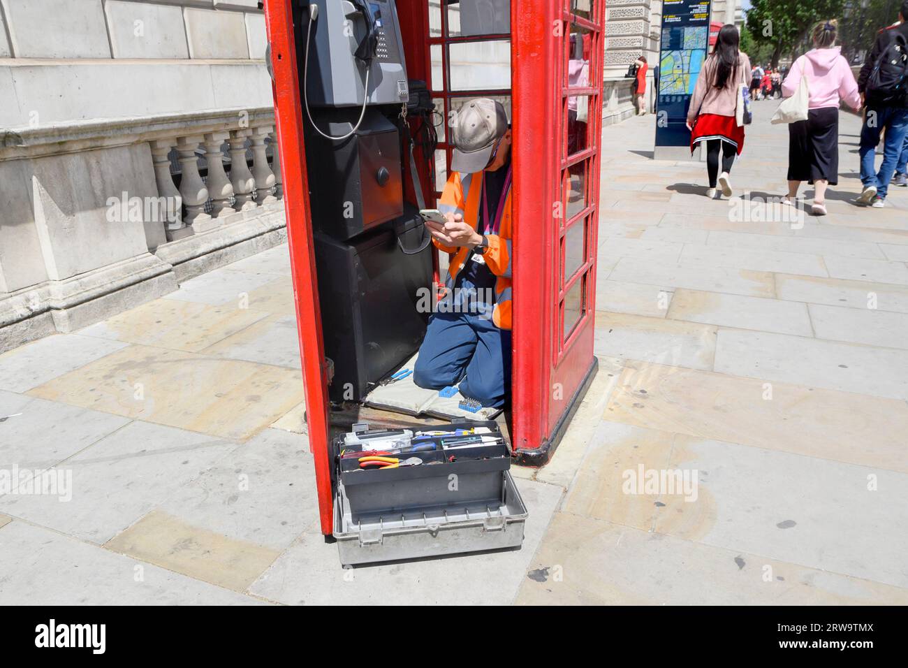 Man in a phone box hi-res stock photography and images - Alamy