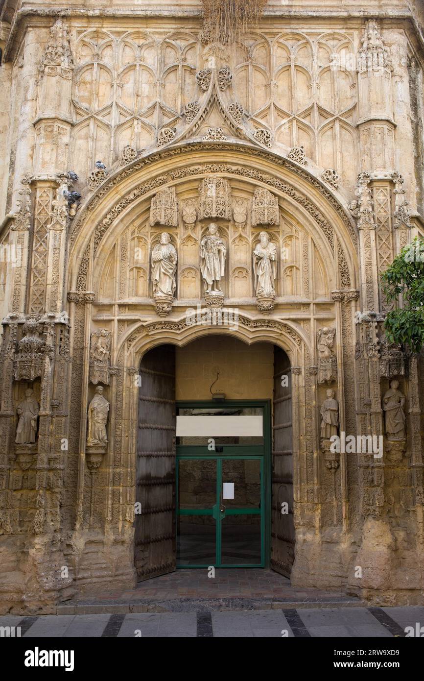 Archway facade in Isabelline Gothic style from 1512 of the Hospital of ...