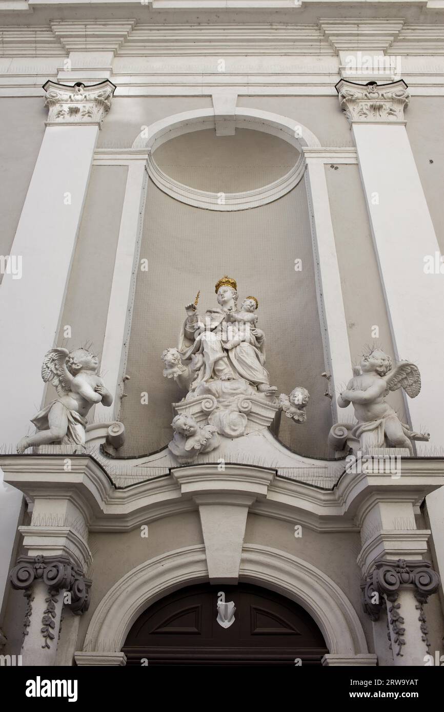 Religious sculptures on the exterior of St Michael 18th century church ...