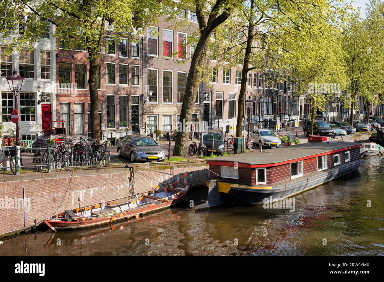 Amsterdam canal waterfront in Netherlands Stock Photo - Alamy
