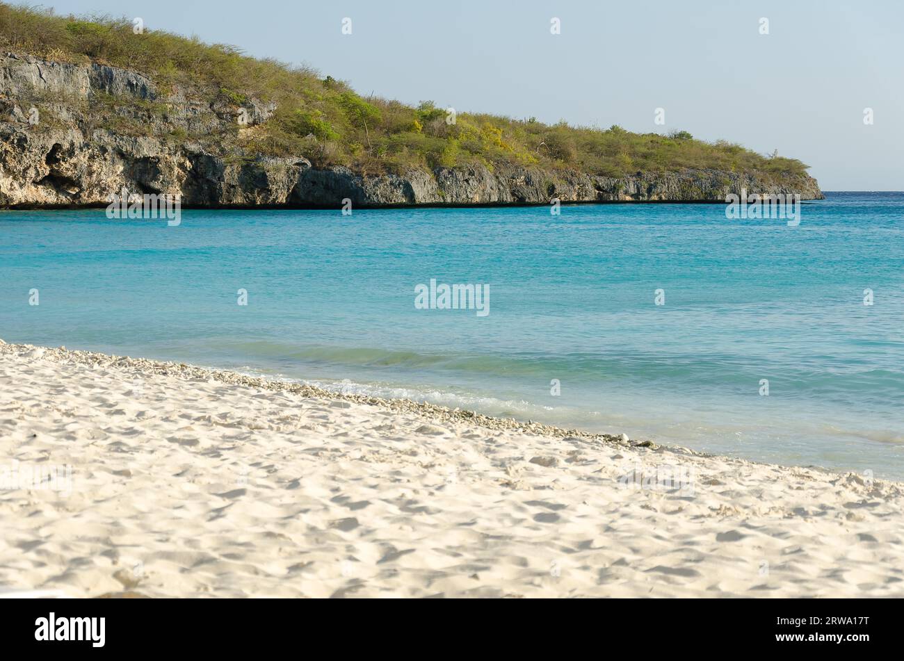 Beach in Curacao a Caribbean Island. White beach, blue sky and crystal ...